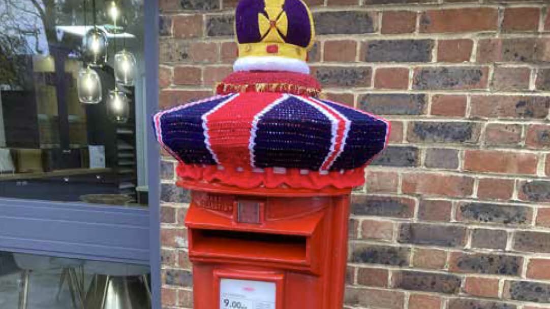 Knitted crown for Petersfield post box to celebrate coronation ...