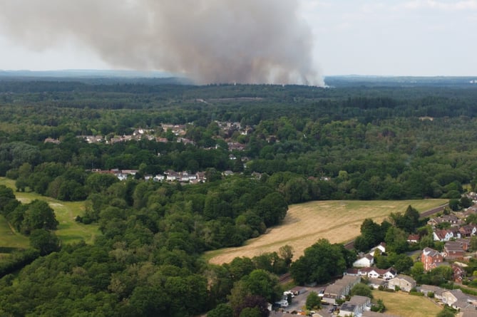 Fire crews tackling huge wildfire on the MOD-owned Longmoor Ranges near ...